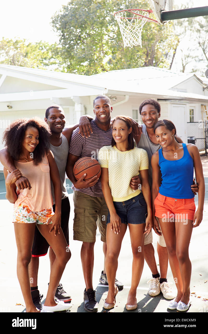 Group Of Young Friends Playing Basketball Match Stock Photo - Alamy