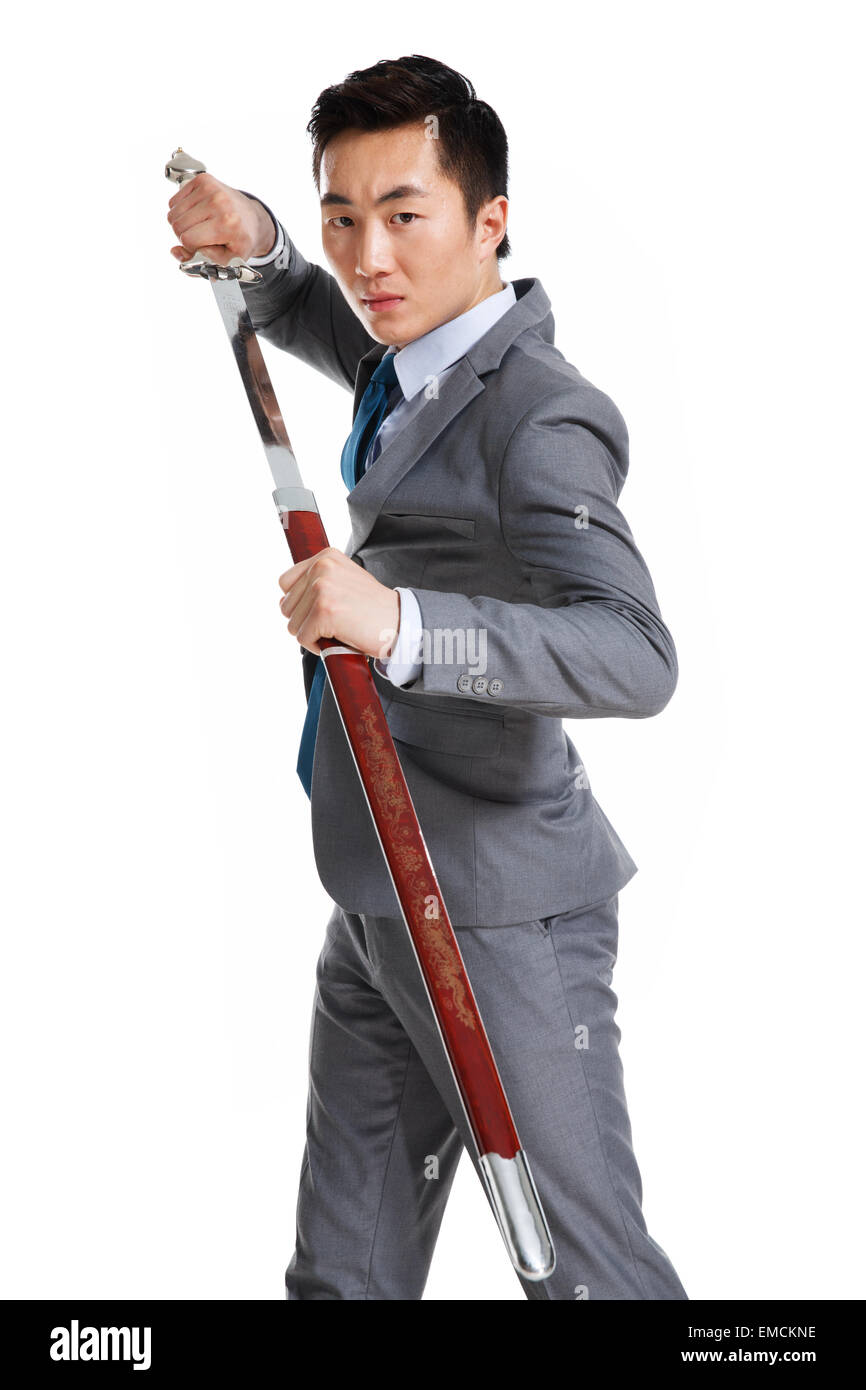 A business young man holding a sword Stock Photo - Alamy