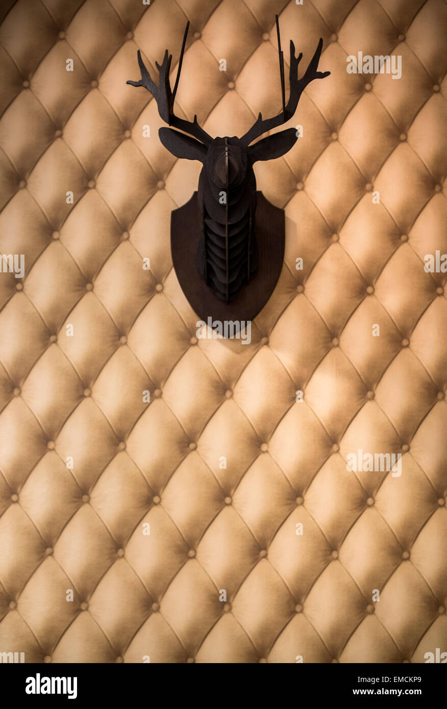 Cardboard deer antler hanging on a padded wall Stock Photo - Alamy