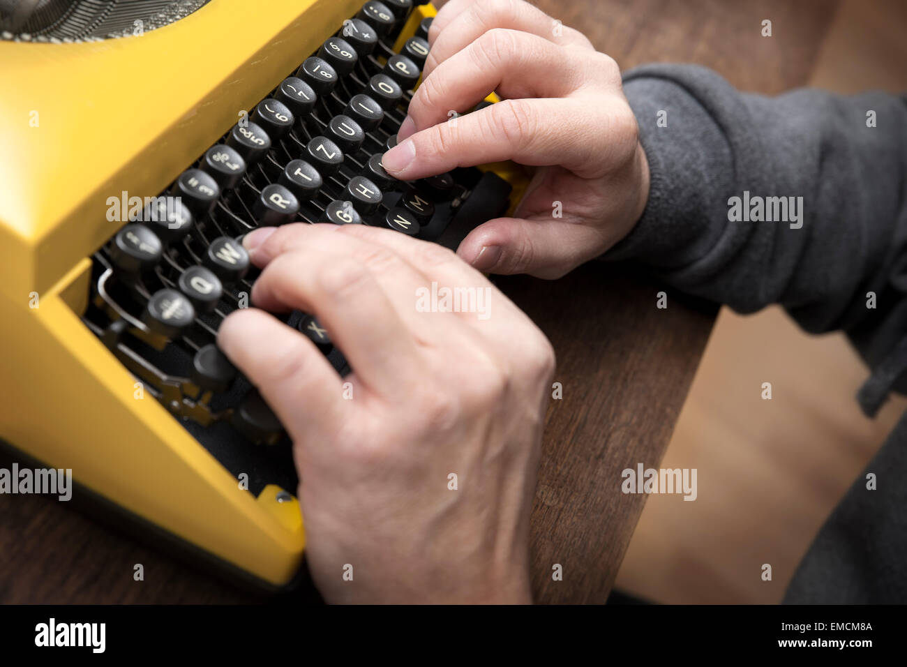 Hands typing on old typewriter Stock Photo - Alamy