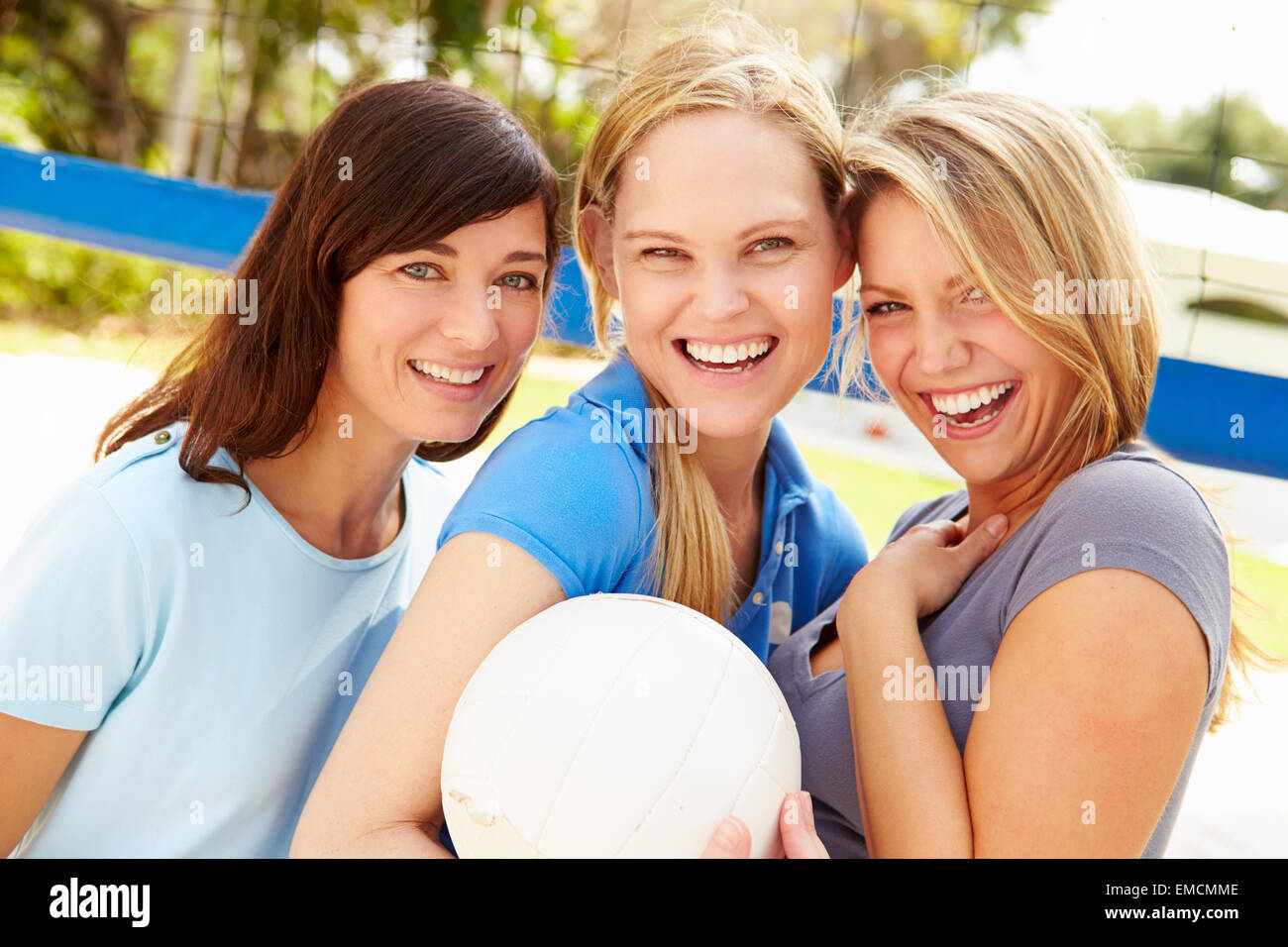 Group Of Young Women Playing Volleyball Match Stock Photo - Alamy