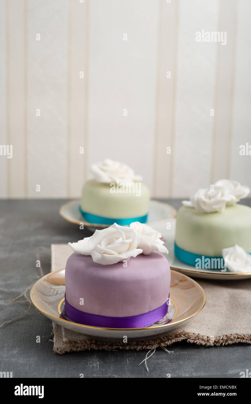 Small tartlets decorated with roses from sugar Stock Photo - Alamy