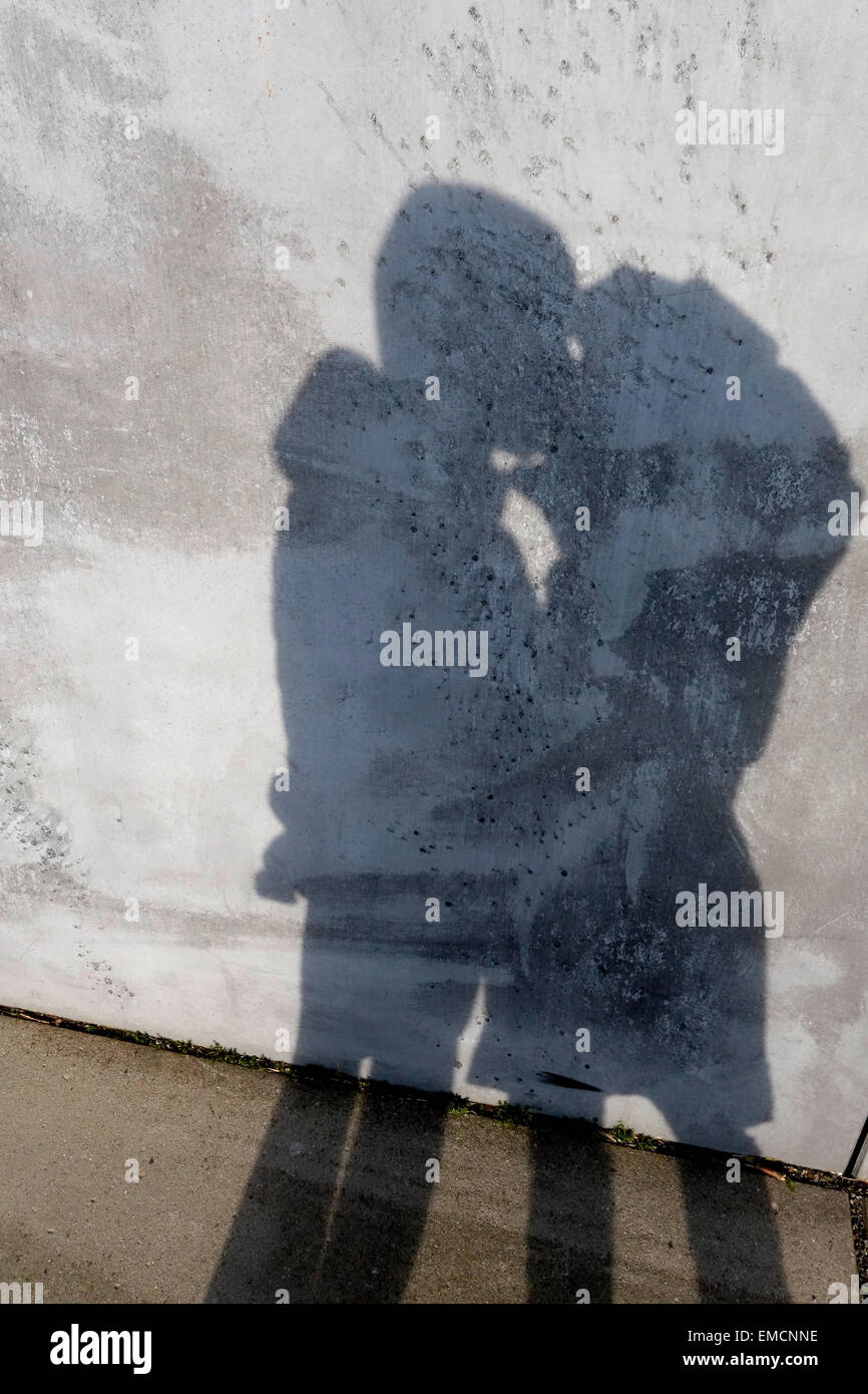 Shadow man photographing woman hi-res stock photography and images - Alamy