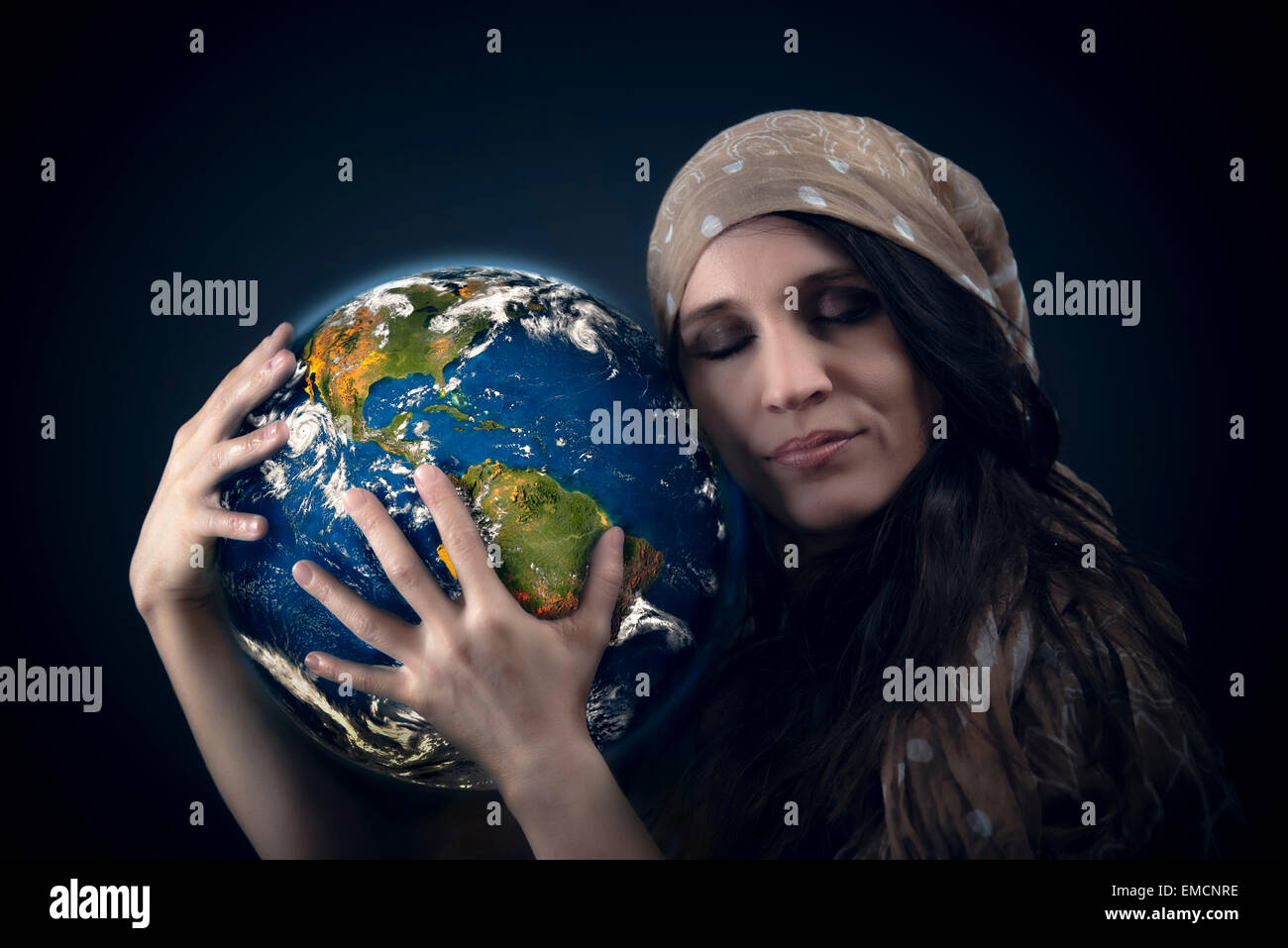 Woman hugging globe Stock Photo - Alamy