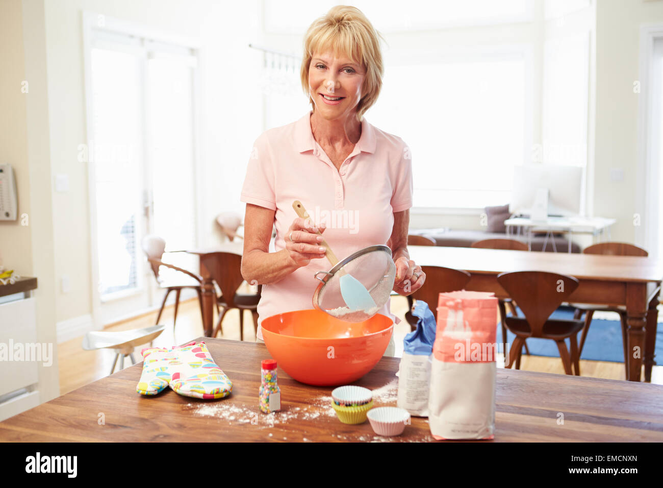 Senior Woman Baking In Kitchen Stock Photo - Alamy