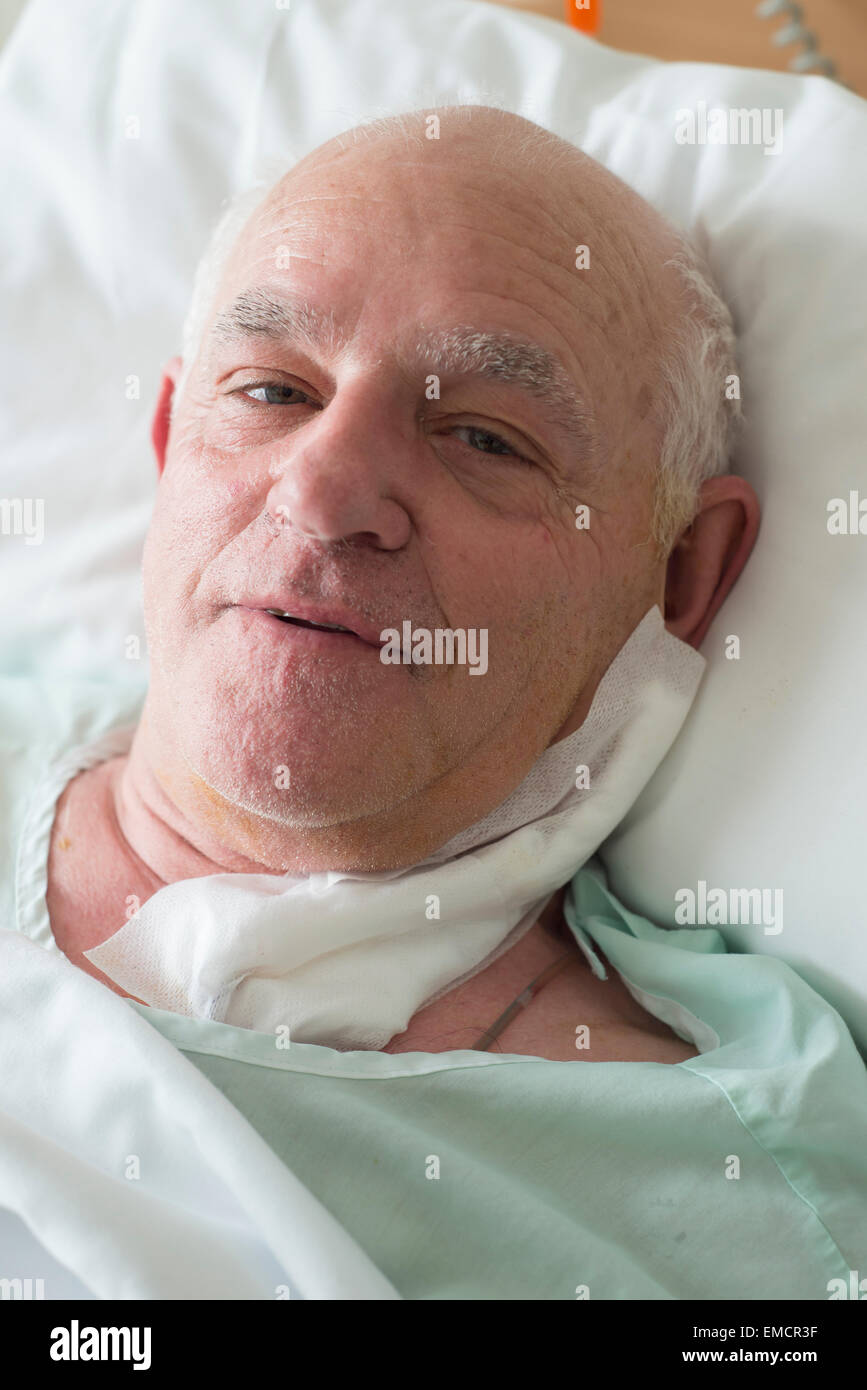 Senior man in hospital recovering after surgery Stock Photo - Alamy