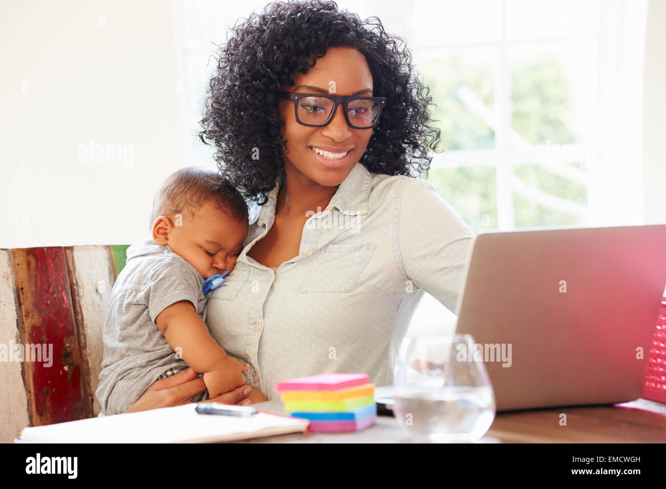 African business woman with baby office hi-res stock photography and ...