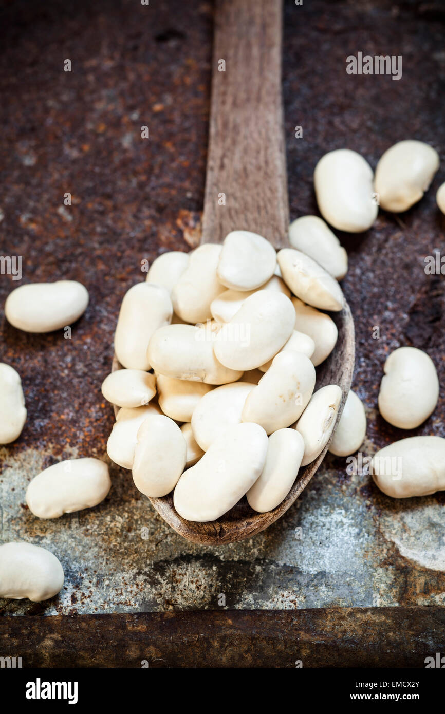Wooden spoon of Giant white beans Stock Photo - Alamy