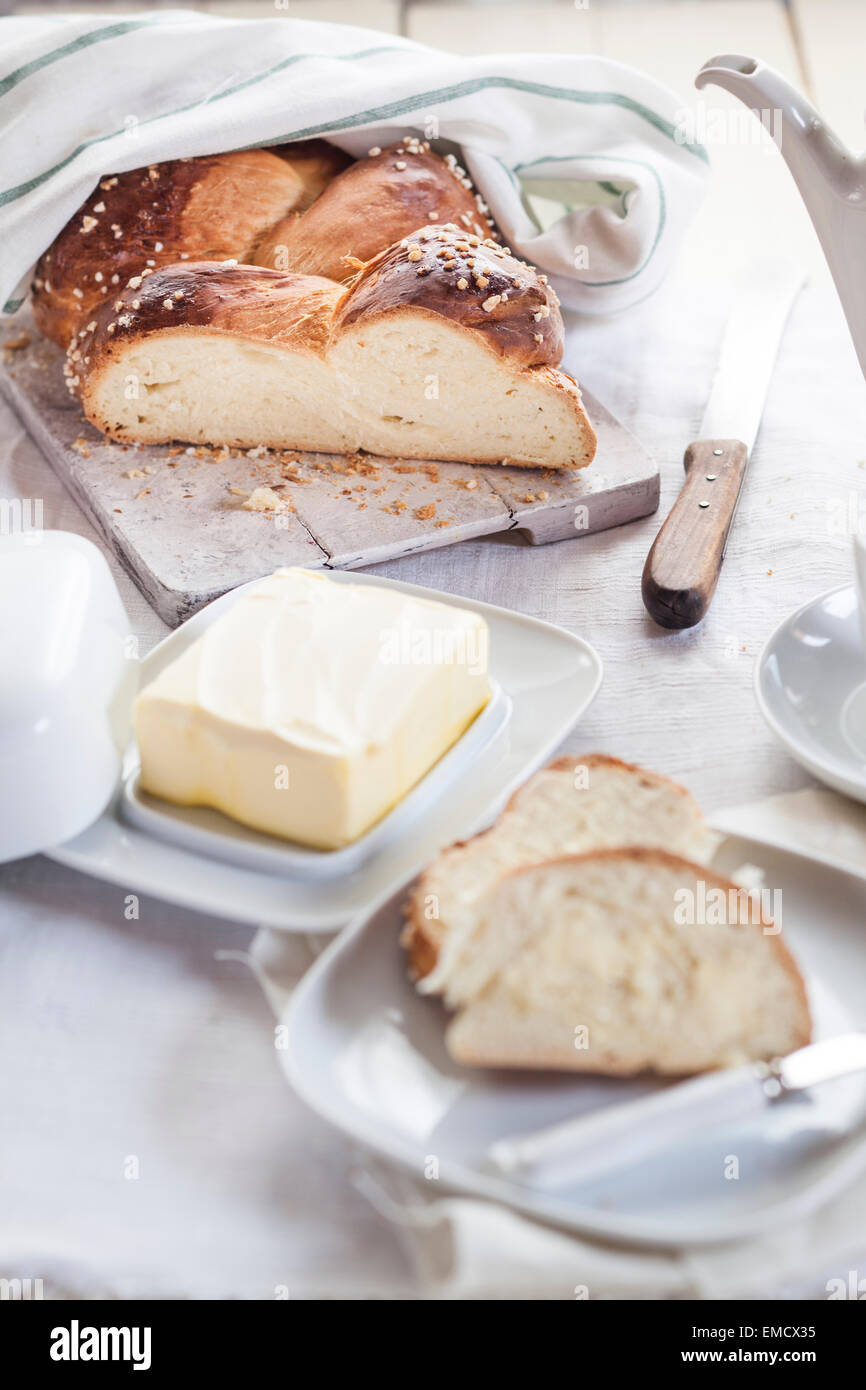 Sliced Challah and butter Stock Photo - Alamy