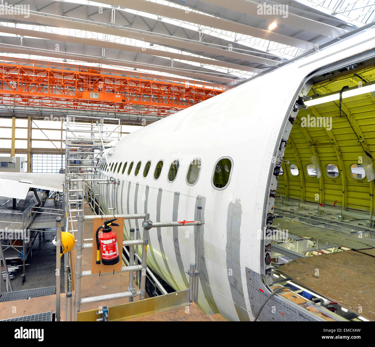 Airplane construction in a hangar Stock Photo - Alamy