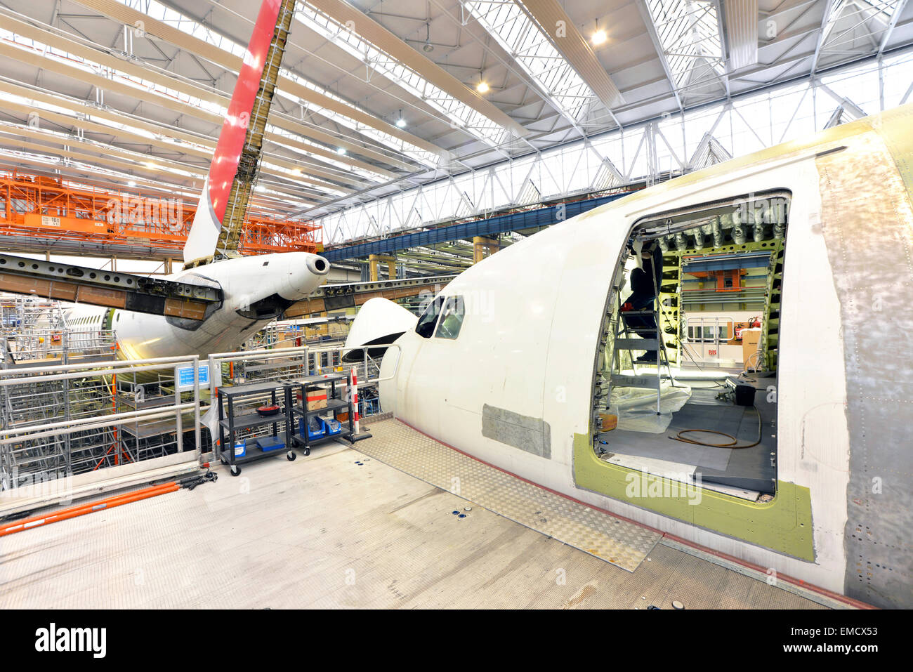 Airplane construction in a hangar Stock Photo - Alamy