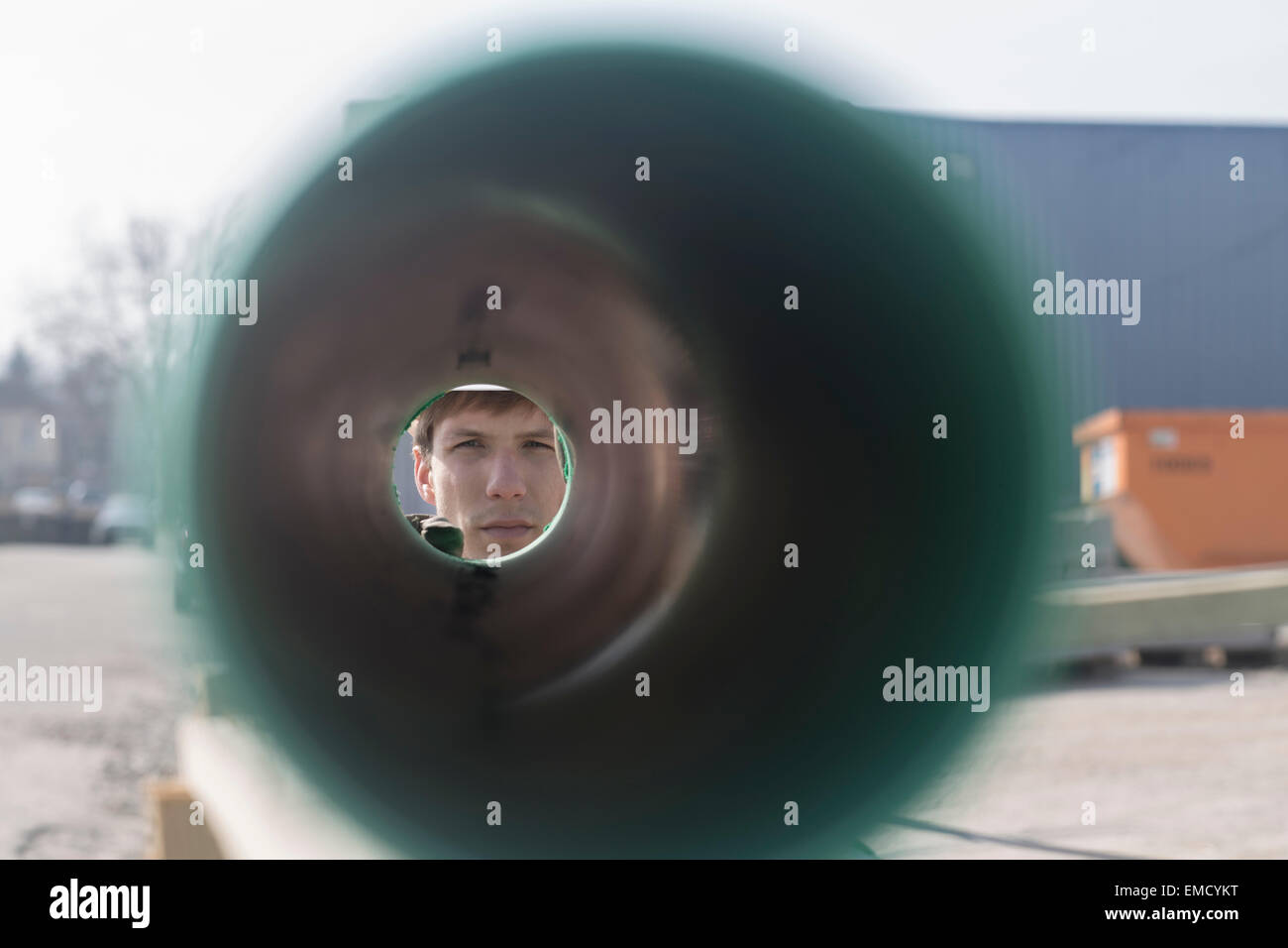 Through pipe view of construction worker hi-res stock photography and ...