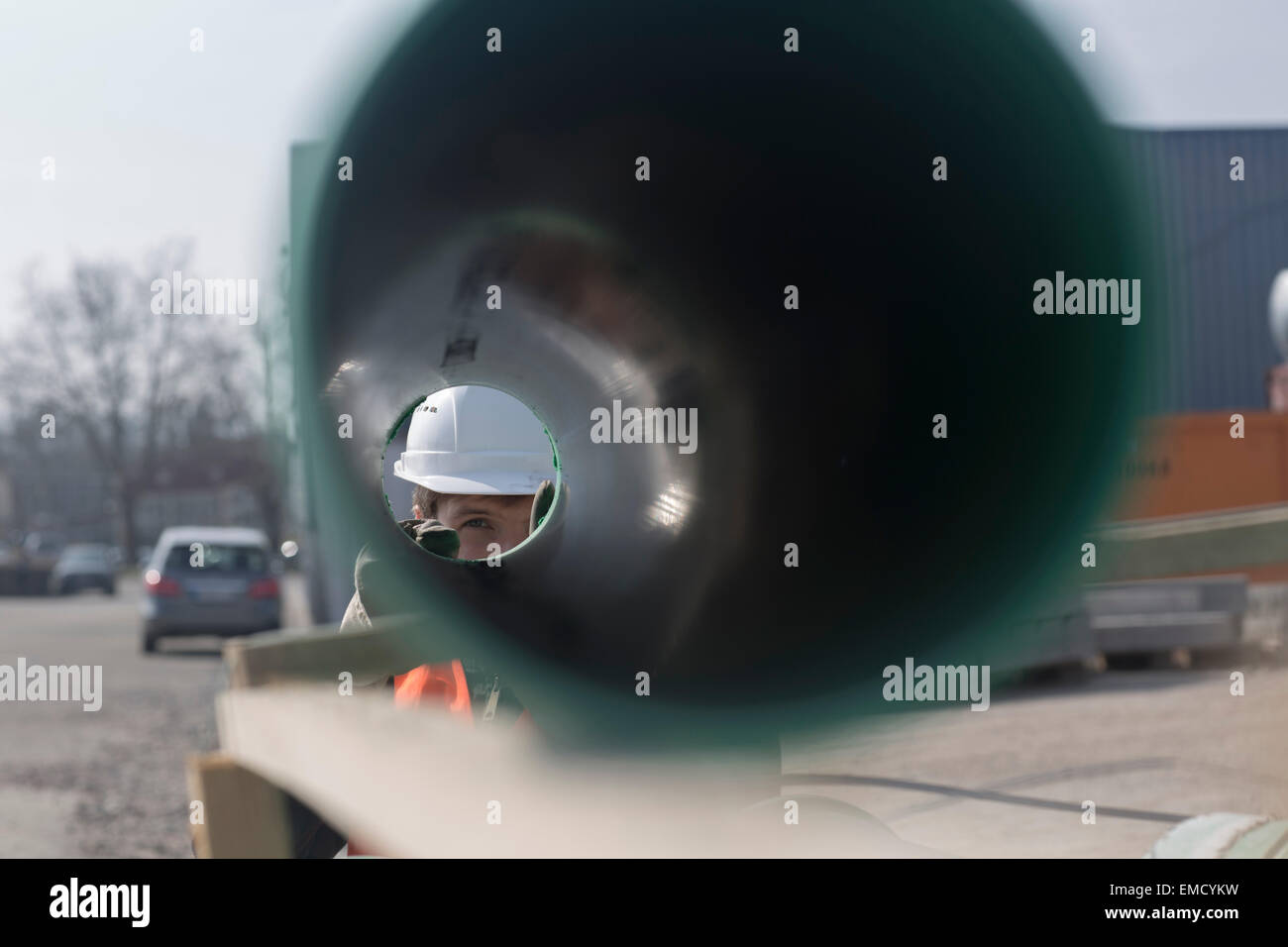 Construction looking through pipe hi-res stock photography and images ...