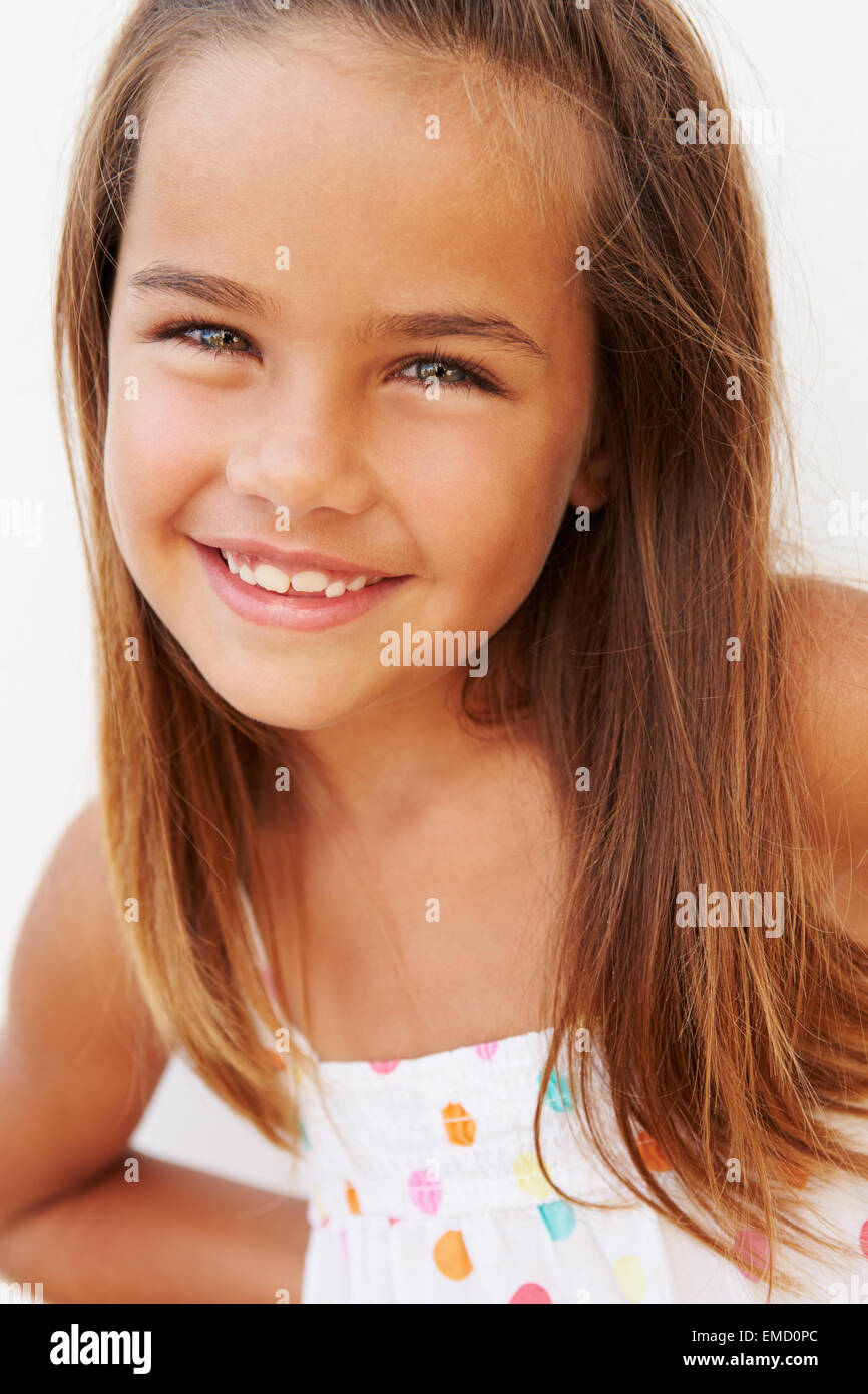 Portrait Of Pretty Hispanic Girl Standing By Wall Stock Photo - Alamy