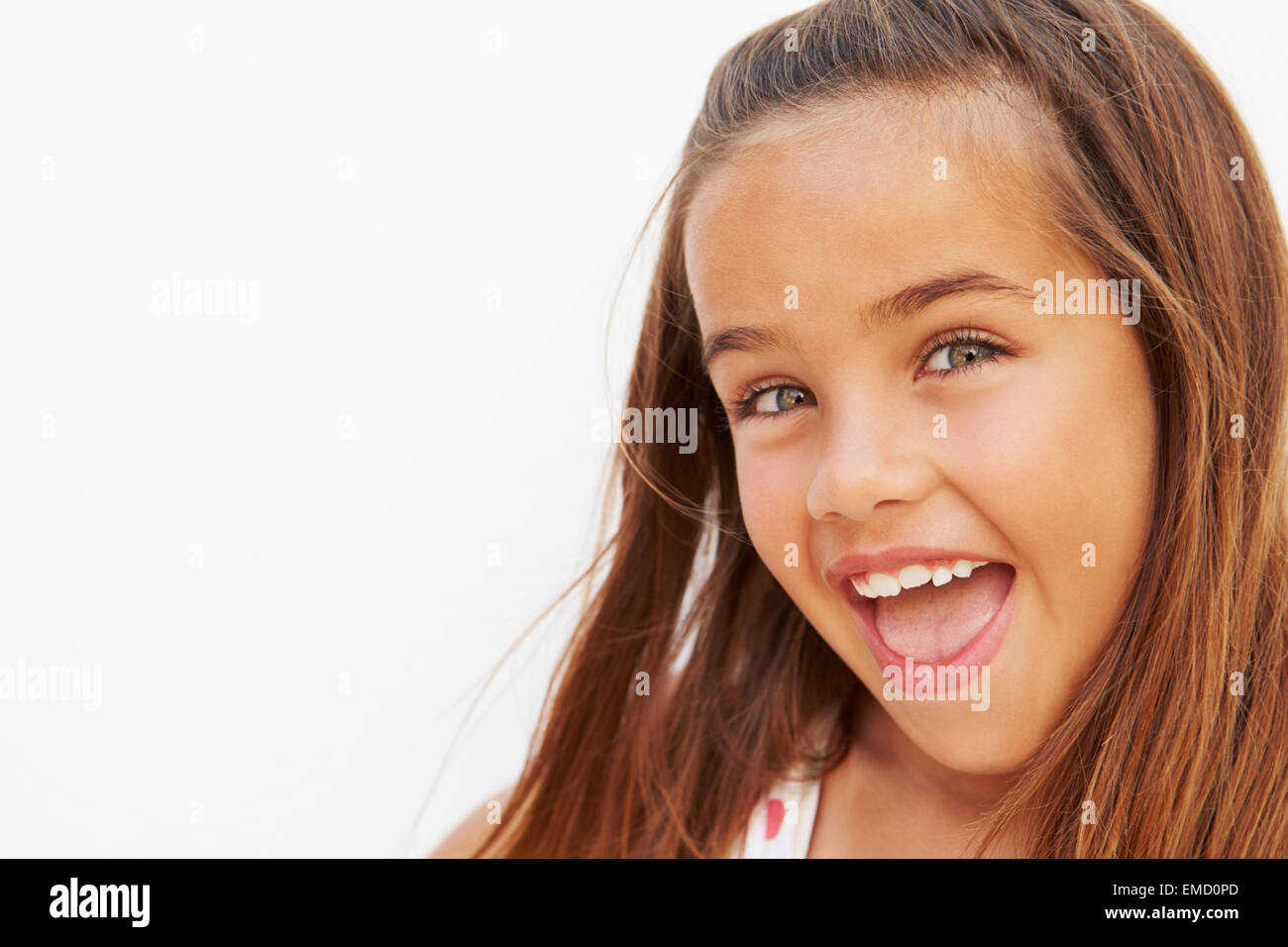 Portrait Of Pretty Hispanic Girl Standing By Wall Stock Photo - Alamy