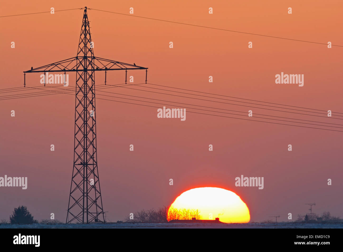 Sunset besides electricity pylon hi-res stock photography and images ...