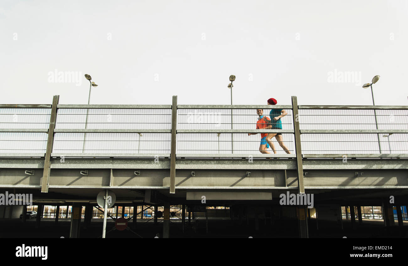 Two young men jogging on bridge Stock Photo - Alamy Two young men jogging on bridge Stock Photo - Alamy