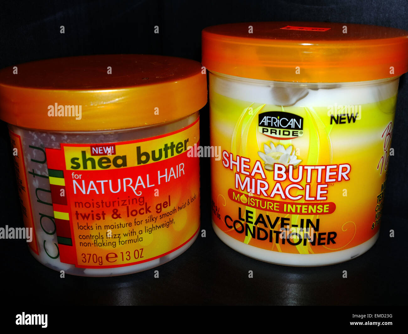 Black hair natural products photographed against a black background ...