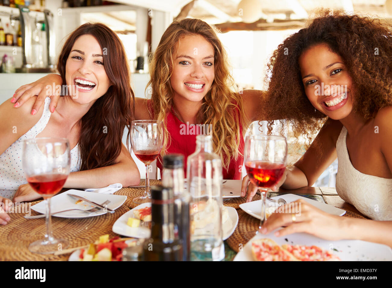 Group Of Female Friends Enjoying Meal In Outdoor Restaurant Stock Photo ...