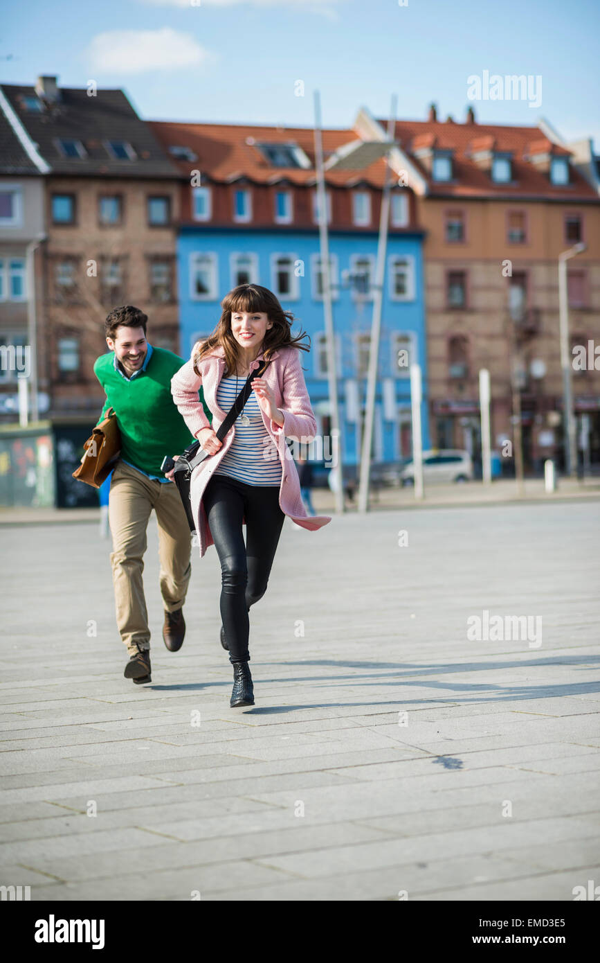 Running people tag city hi-res stock photography and images - Alamy