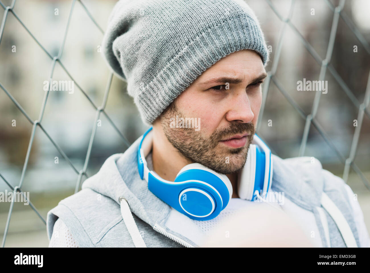 young man with headphones, portrait Stock Photo - Alamy