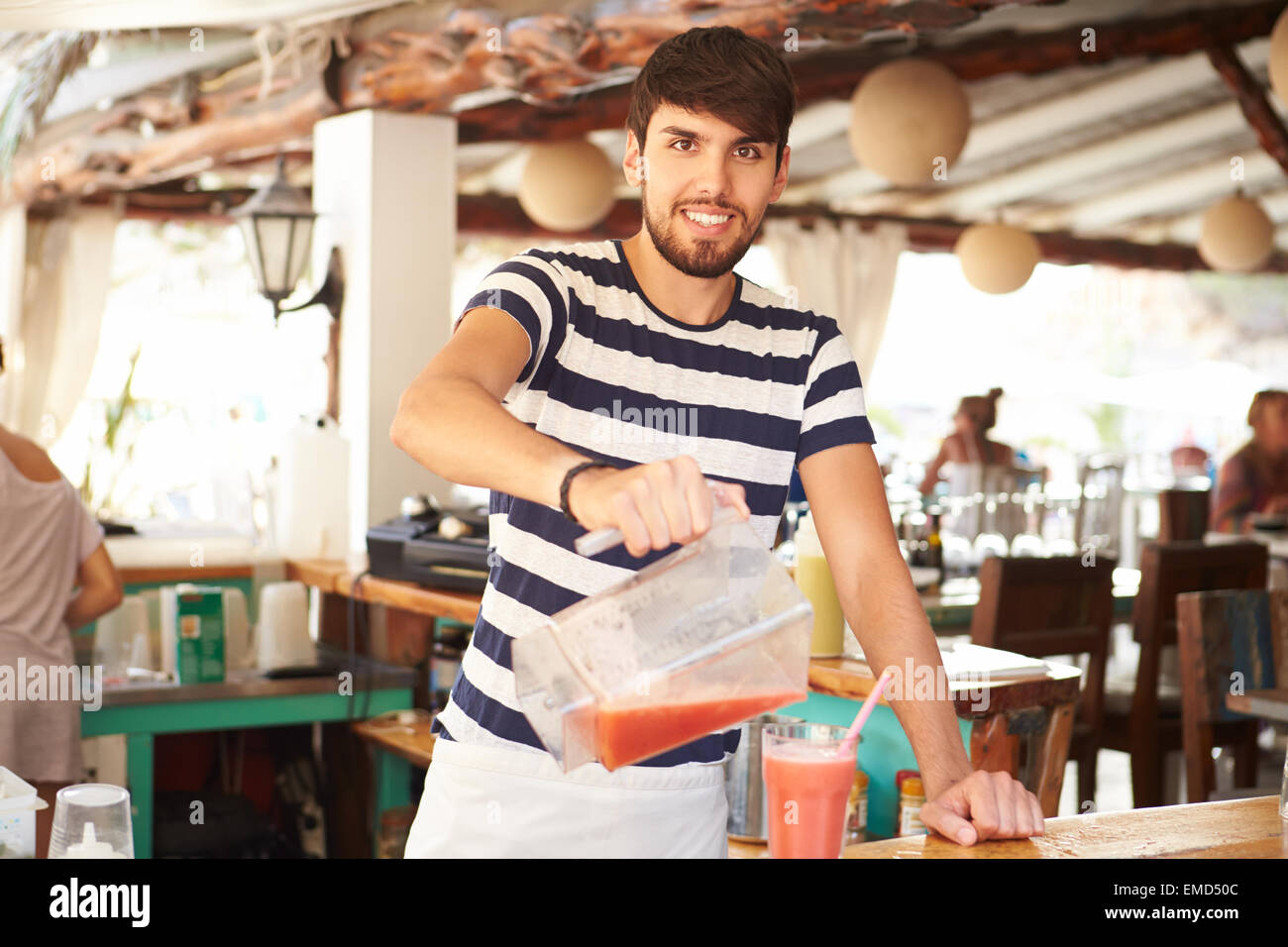 Portrait Of Man In Restaurant Making Fruit Smoothies Stock Photo - Alamy