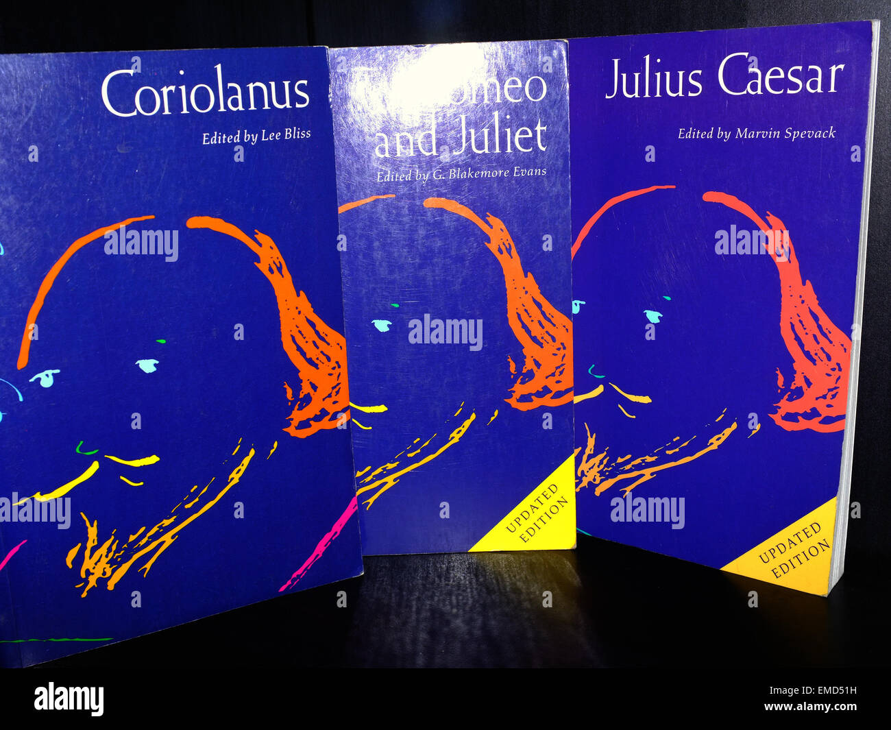 A set of three Shakespeare plays photographed against a black ...