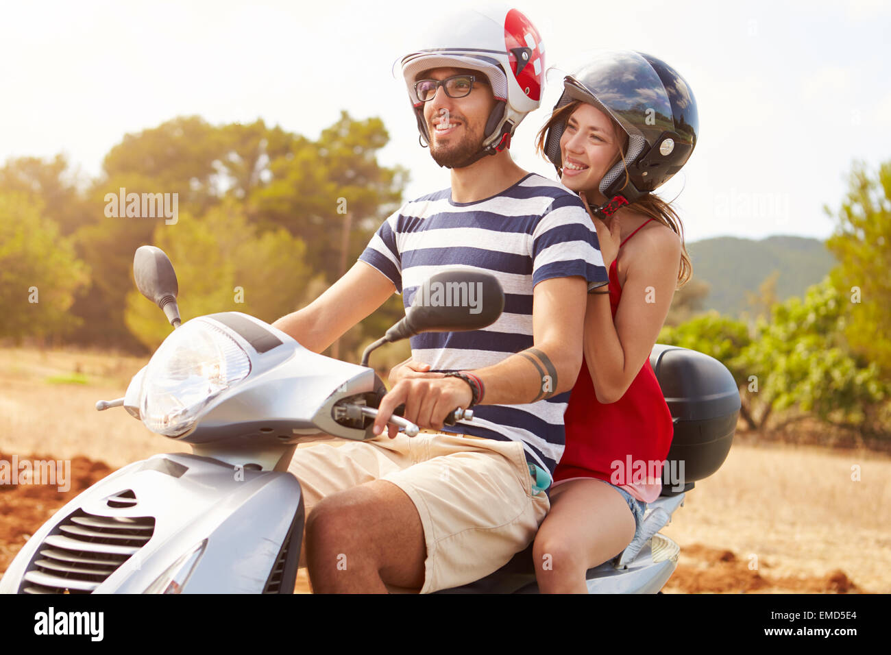 Couple scooter country hi-res stock photography and images - Alamy