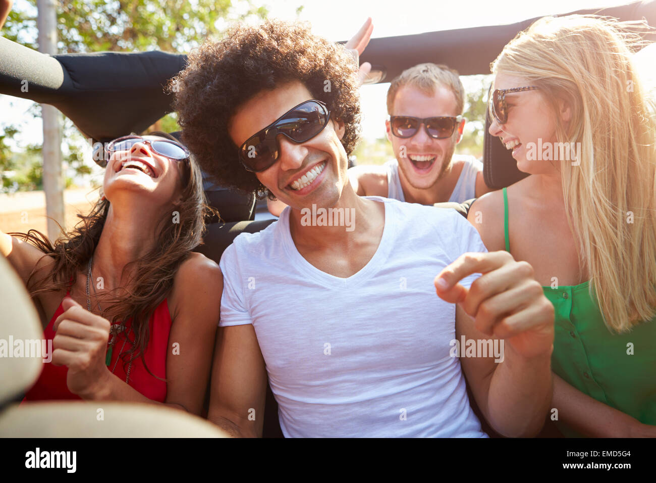 Woman hanging out back car hi-res stock photography and images - Alamy
