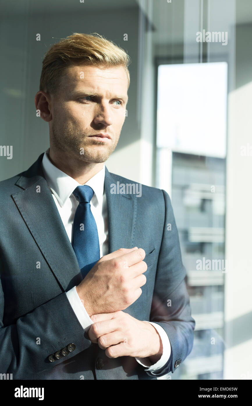 Businessman adjusting his cuffs hi-res stock photography and images - Alamy