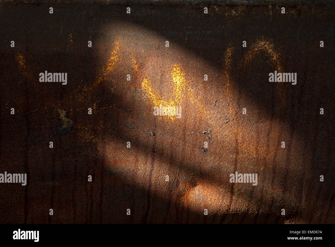 Rusty plate and light Stock Photo - Alamy