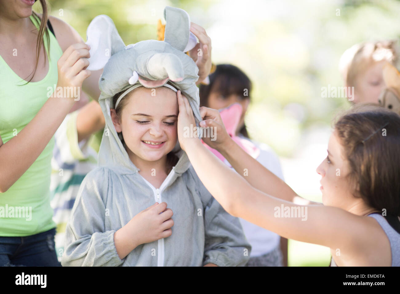 Kids playing wild animal dress-up Stock Photo - Alamy