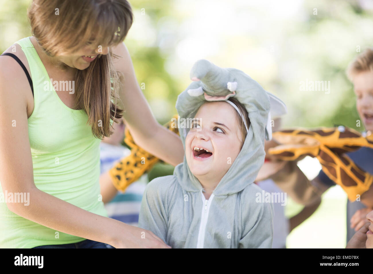 Kids playing wild animal dress-up Stock Photo - Alamy