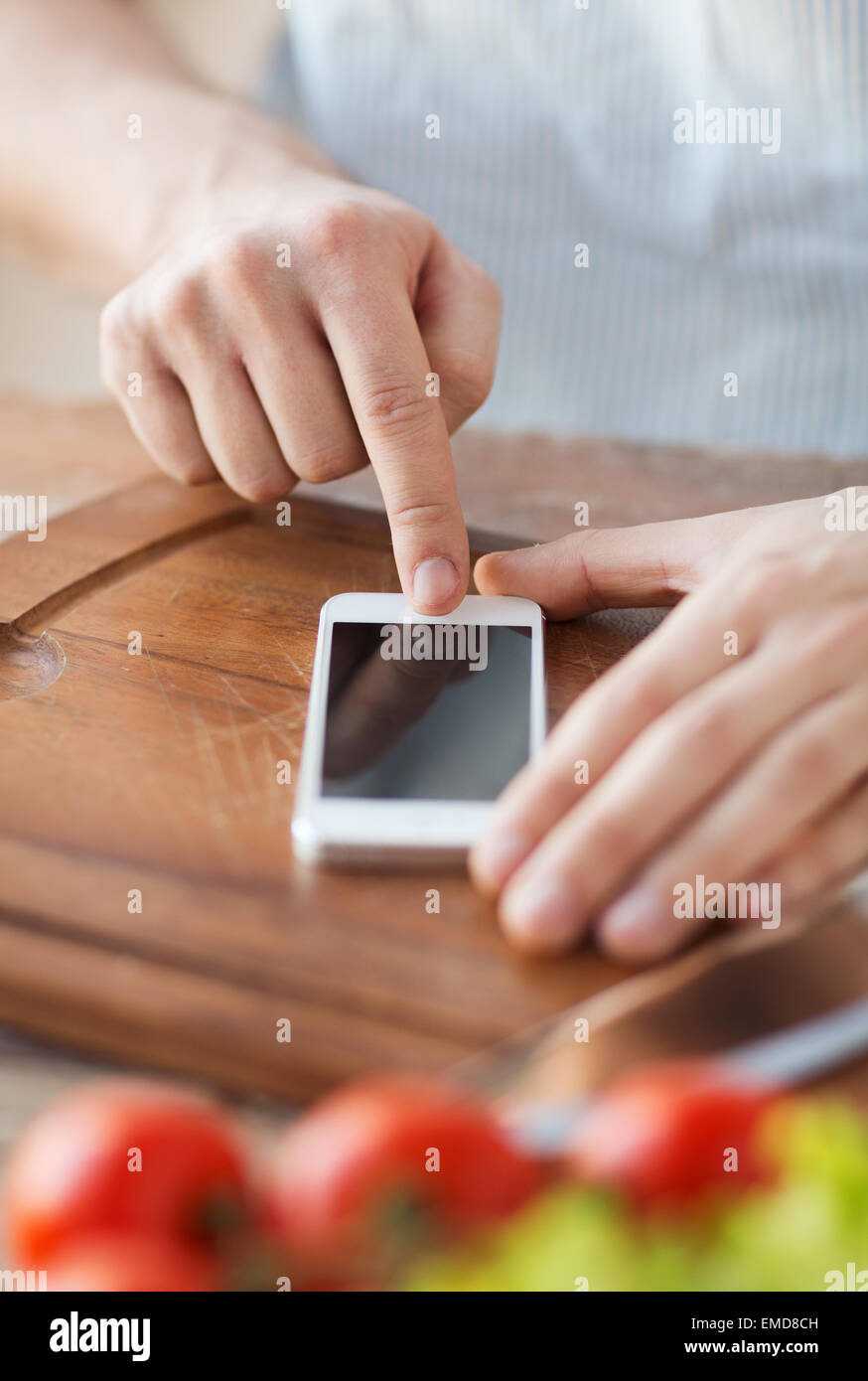 closeup of man pointing finger to smartphone Stock Photo - Alamy