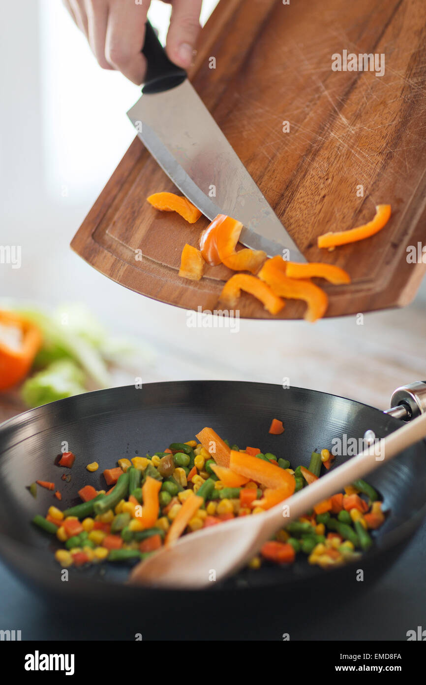 Adding green peppers hi-res stock photography and images - Alamy