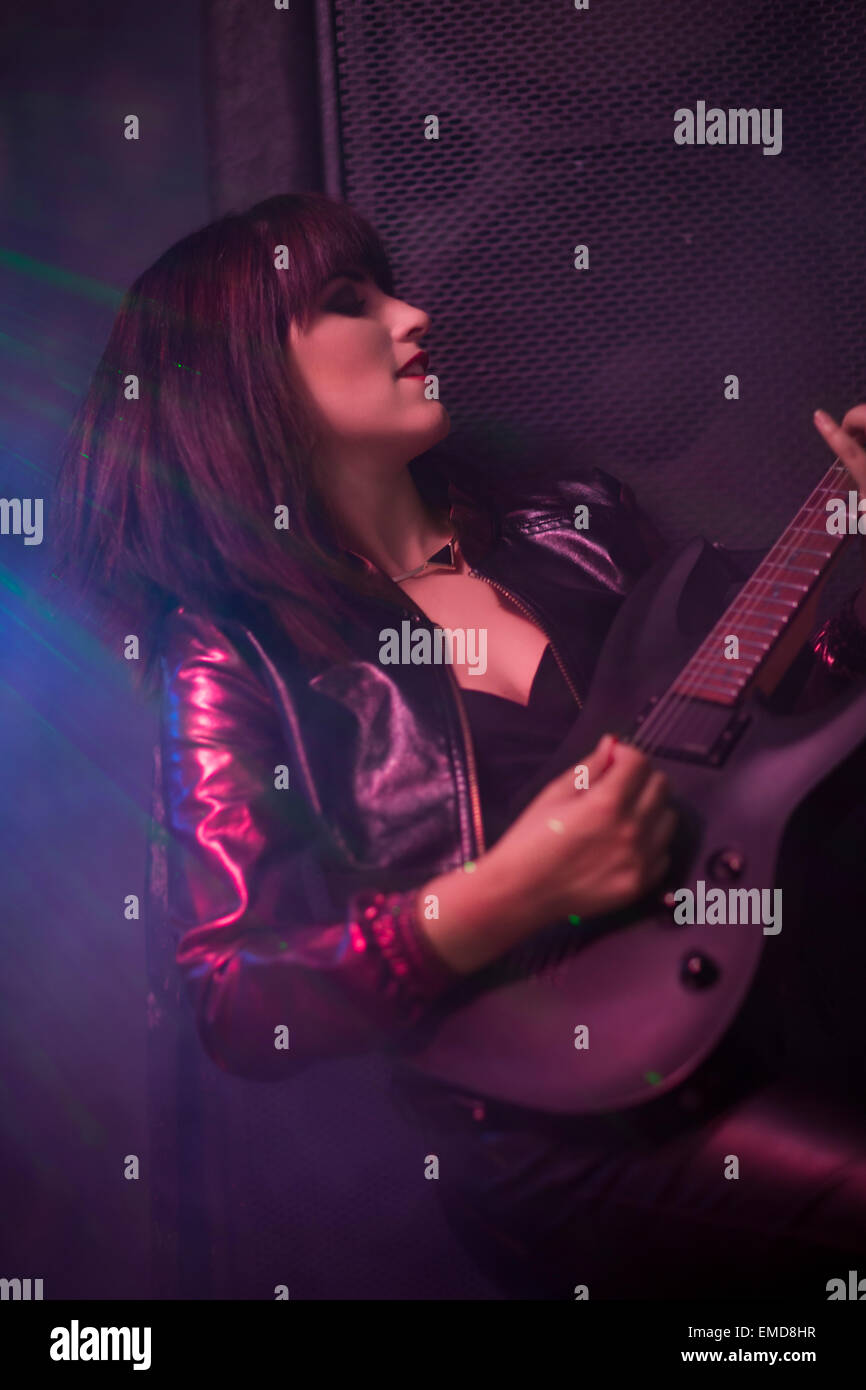 Female rock guitar player Stock Photo - Alamy