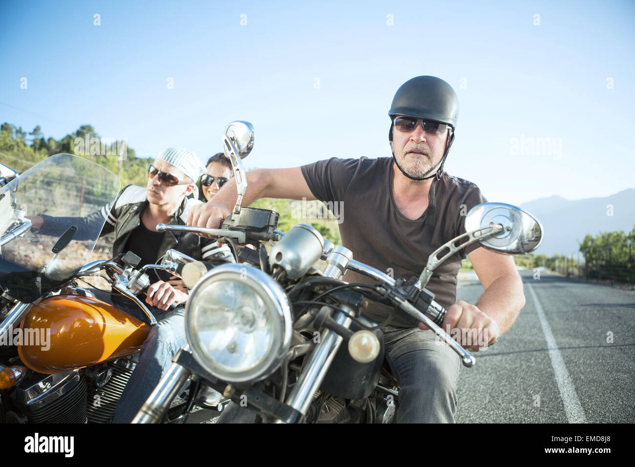 Friends riding motorcycles on open road Stock Photo - Alamy