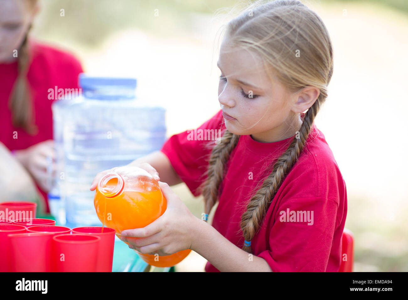 South Africa, Kids on field trip pouring refreshment drinks Stock Photo ... South Africa, Kids on field trip pouring refreshment drinks Stock Photo ...