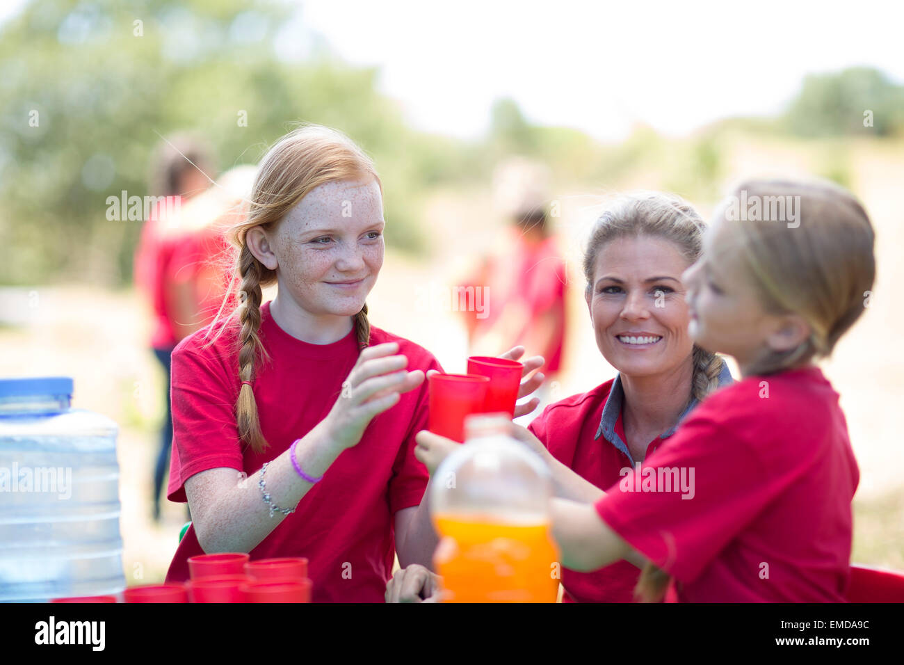South Africa, Kids on field trip pouring refreshment drinks Stock Photo ... South Africa, Kids on field trip pouring refreshment drinks Stock Photo ...