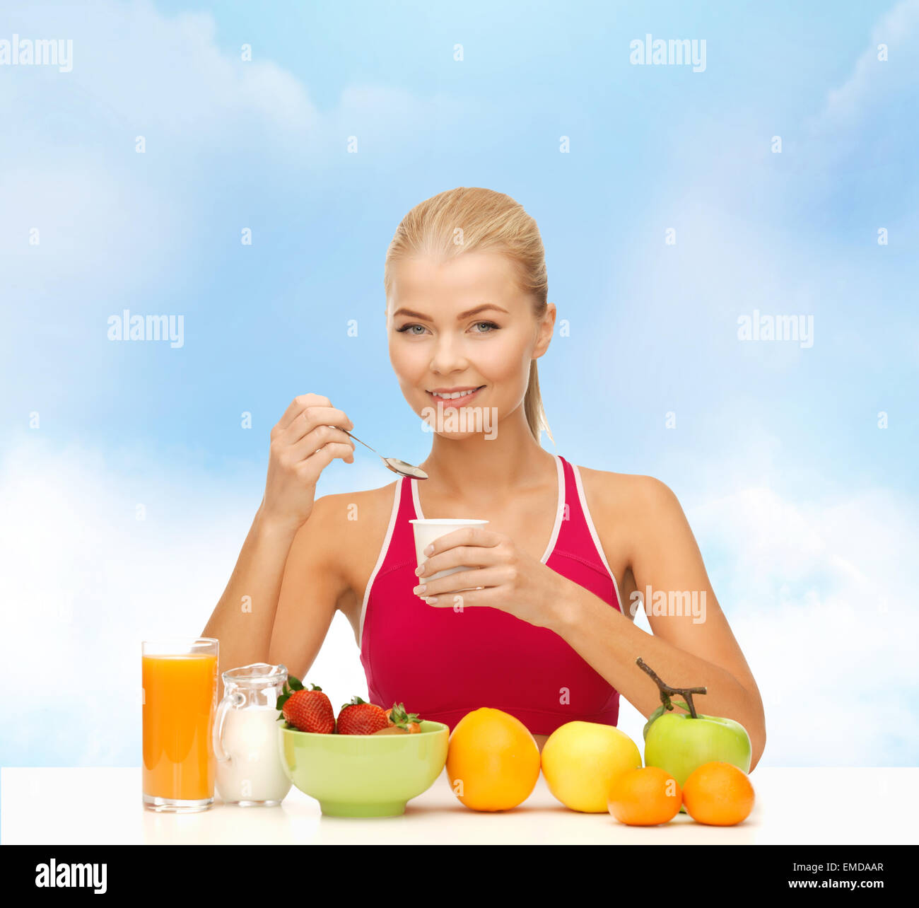 young woman eating healthy breakfast Stock Photo - Alamy