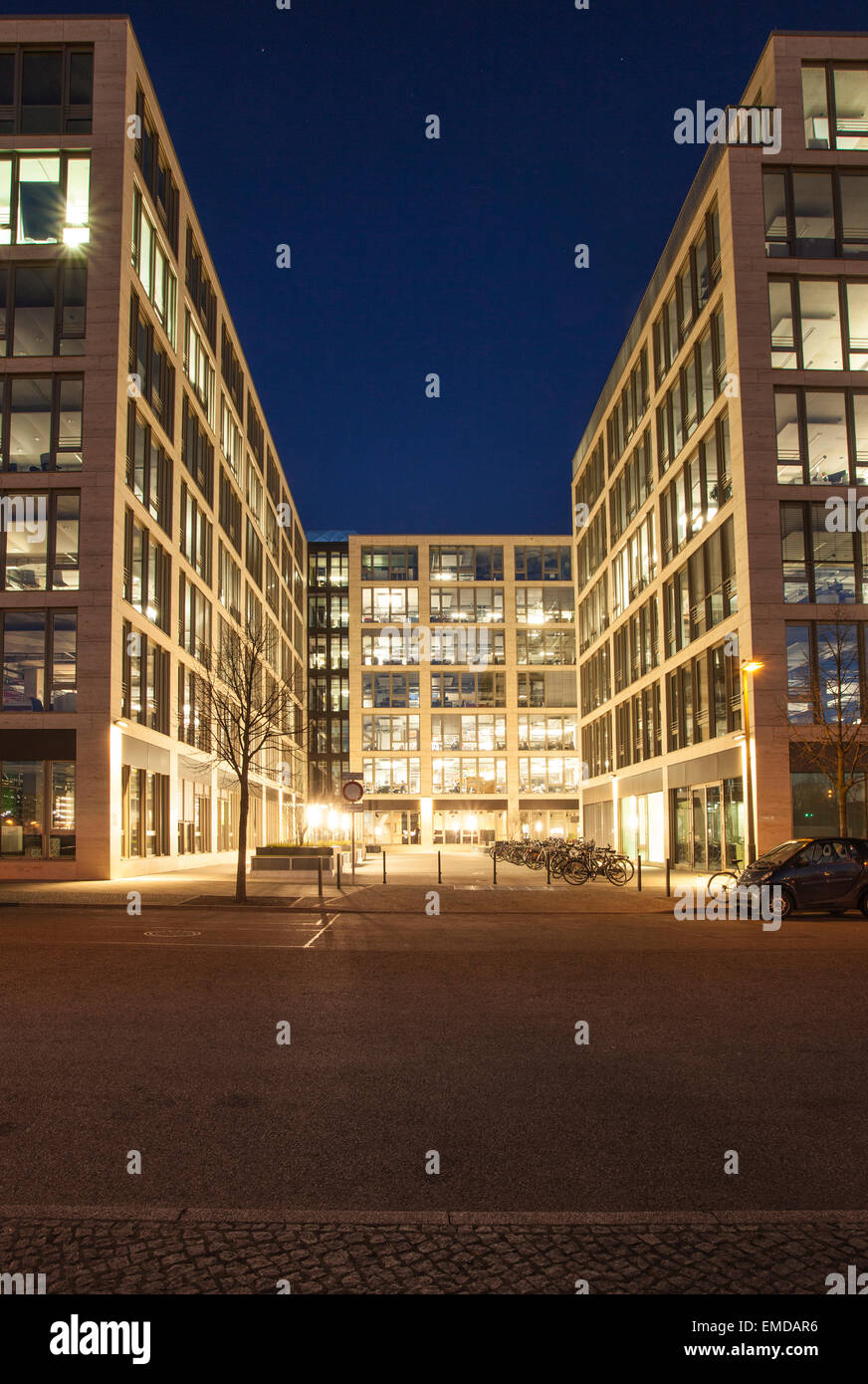 Germany, Berlin, lighted modern office buildings at development area ...