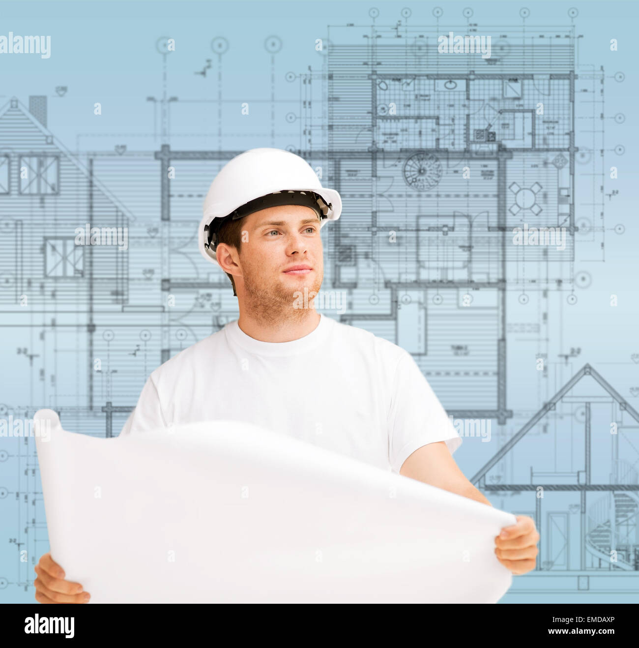 male architect looking at blueprint Stock Photo - Alamy