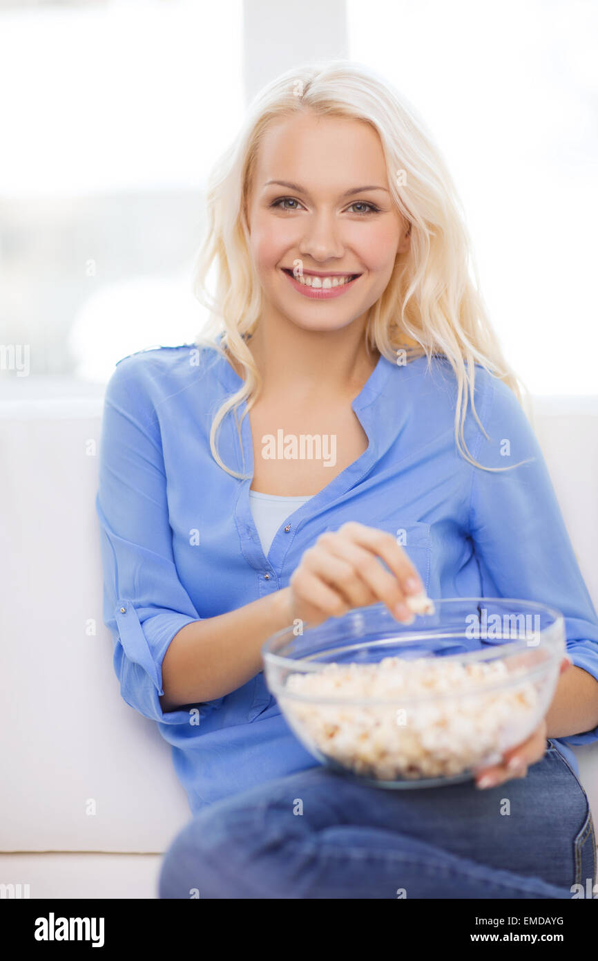 young girl with popcorn ready to watch movie Stock Photo - Alamy