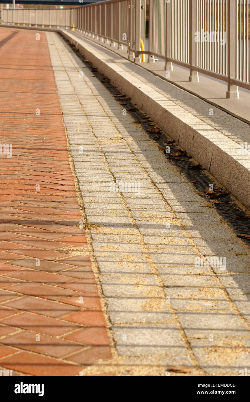 Railing casts shadow Stock Photo - Alamy