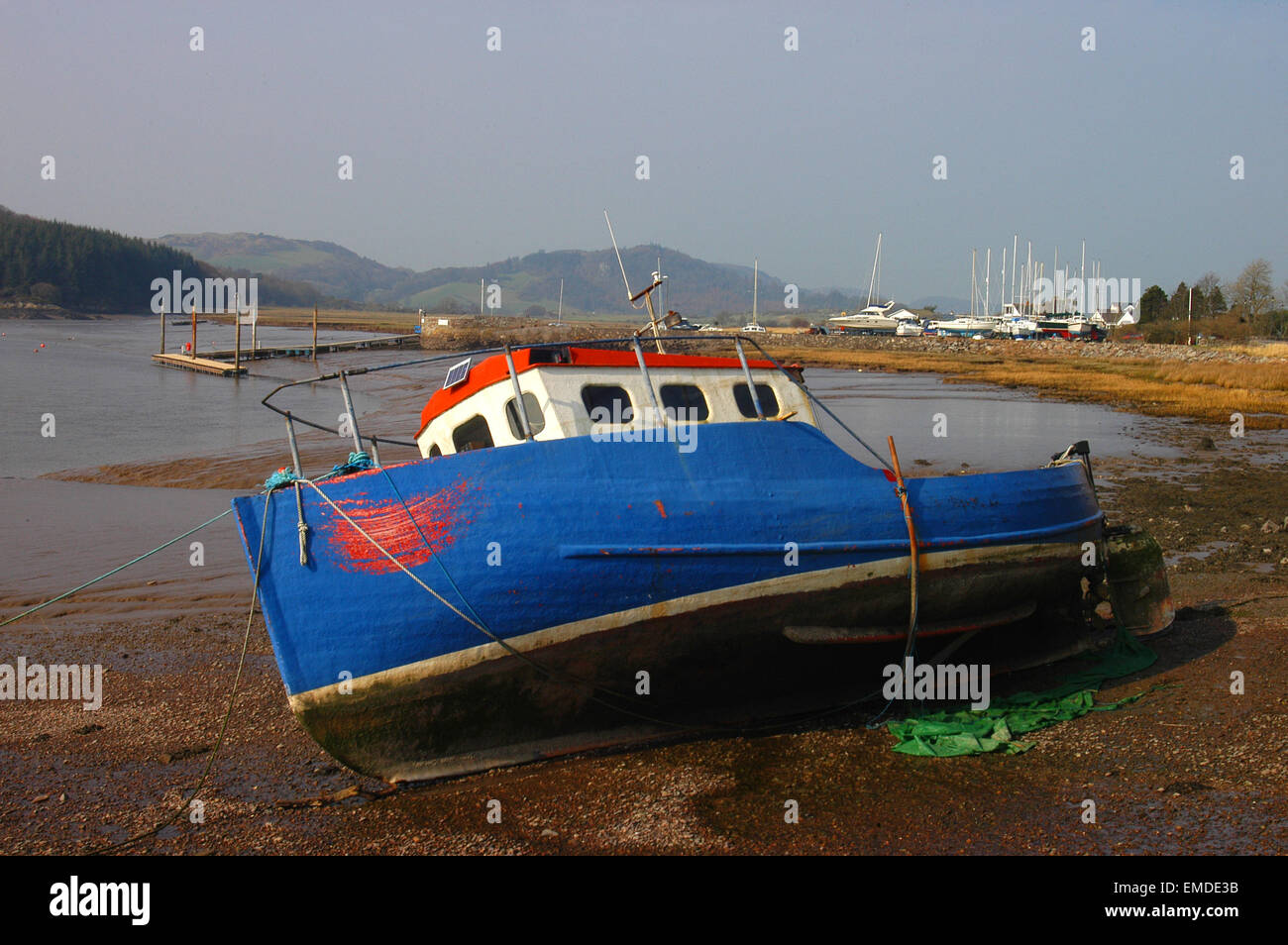 Beached fishing boat Stock Photo - Alamy