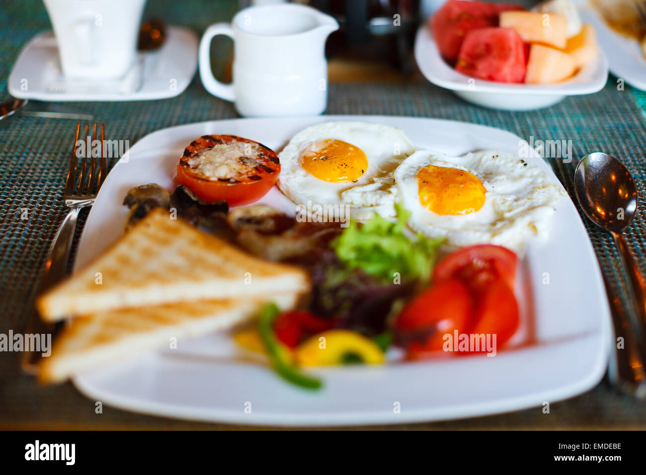 Breakfast with fried eggs Stock Photo - Alamy