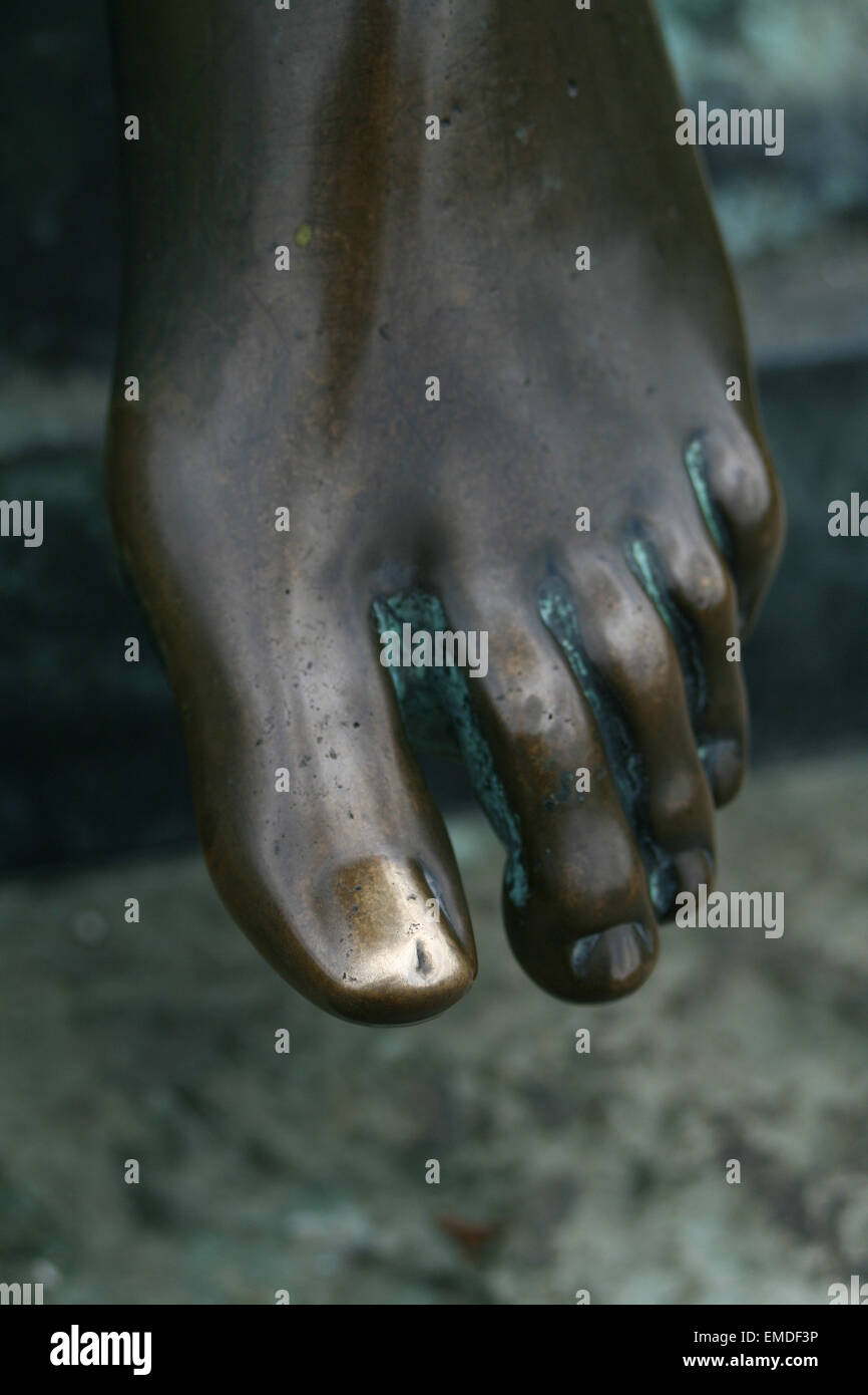 Brass foot statue Stock Photo - Alamy