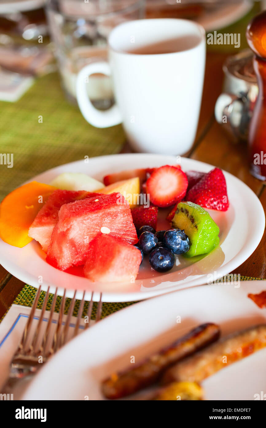 Breakfast with fresh fruits and coffee Stock Photo - Alamy