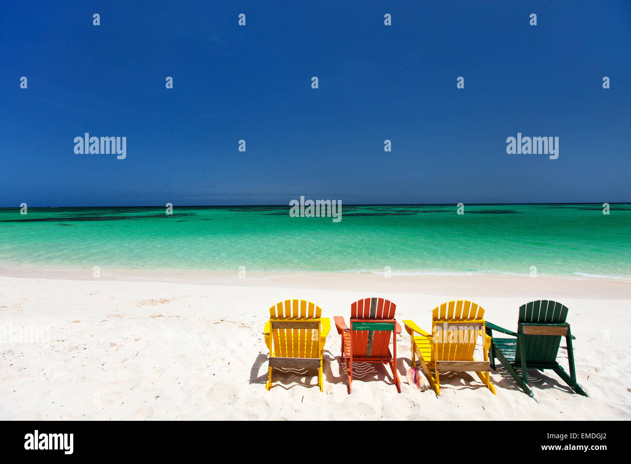Colorful chairs on Caribbean beach Stock Photo - Alamy