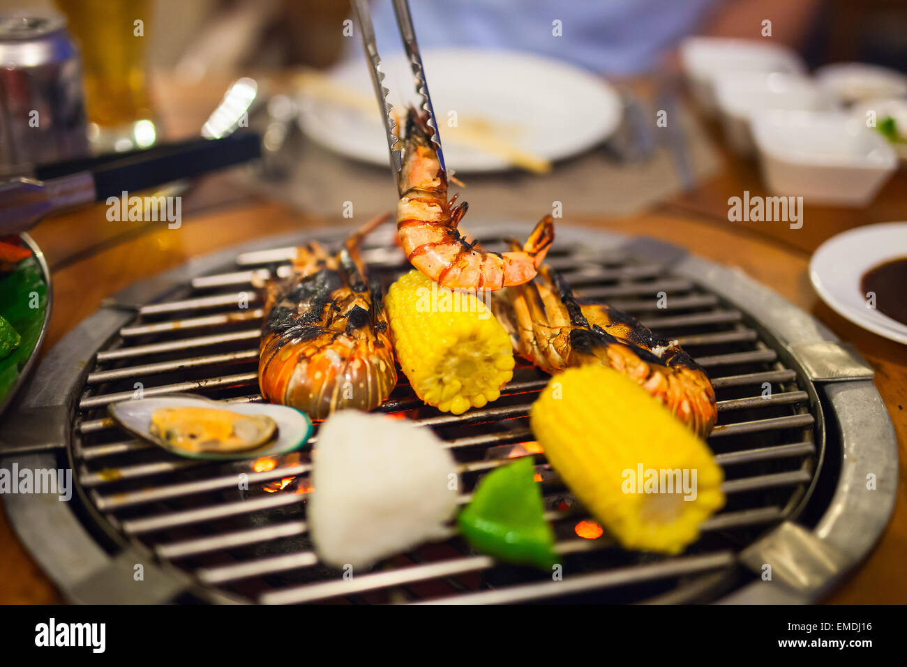 Seafood at grill Lobsters and crayfish Stock Photo - Alamy